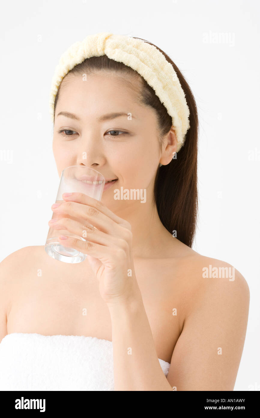 Japanese woman drinking a water Stock Photo - Alamy