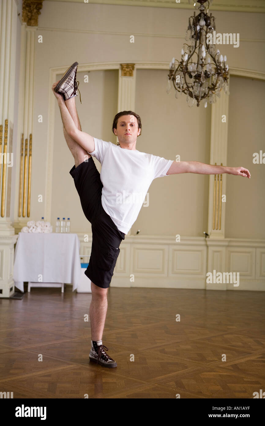Young man dancing to camera Stock Photo - Alamy