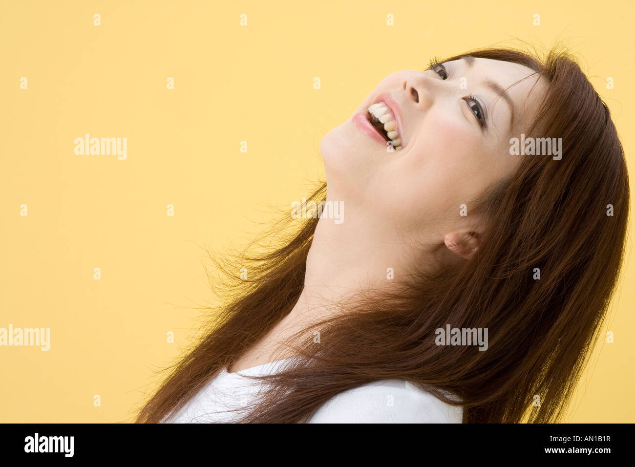 Smiling Japanese woman Stock Photo - Alamy