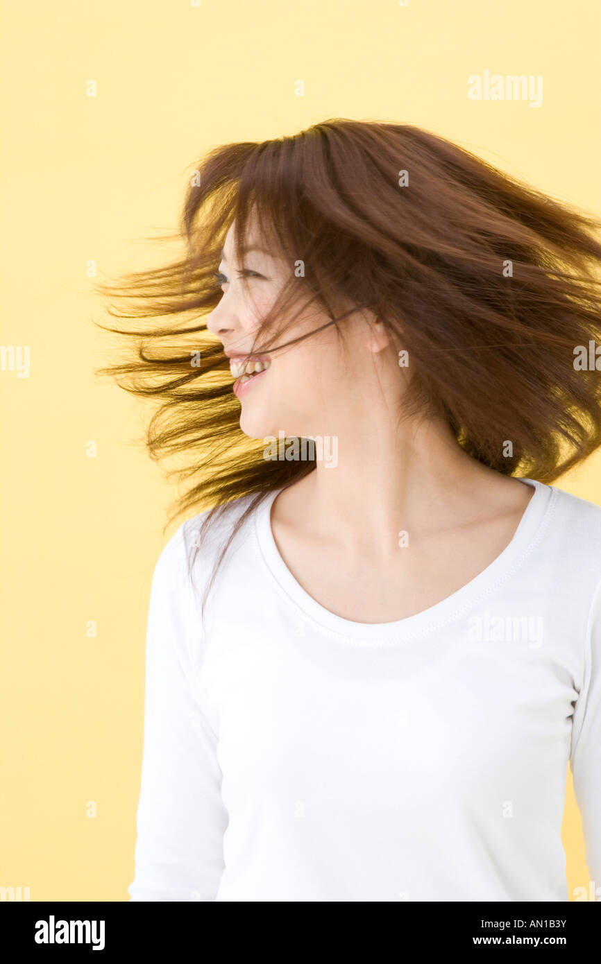 Smiling Japanese woman Stock Photo - Alamy