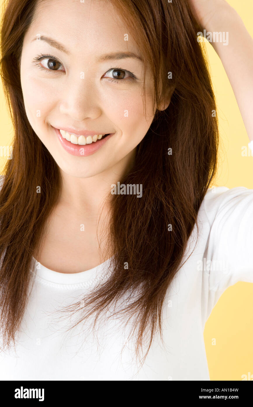 Smiling Japanese woman Stock Photo - Alamy