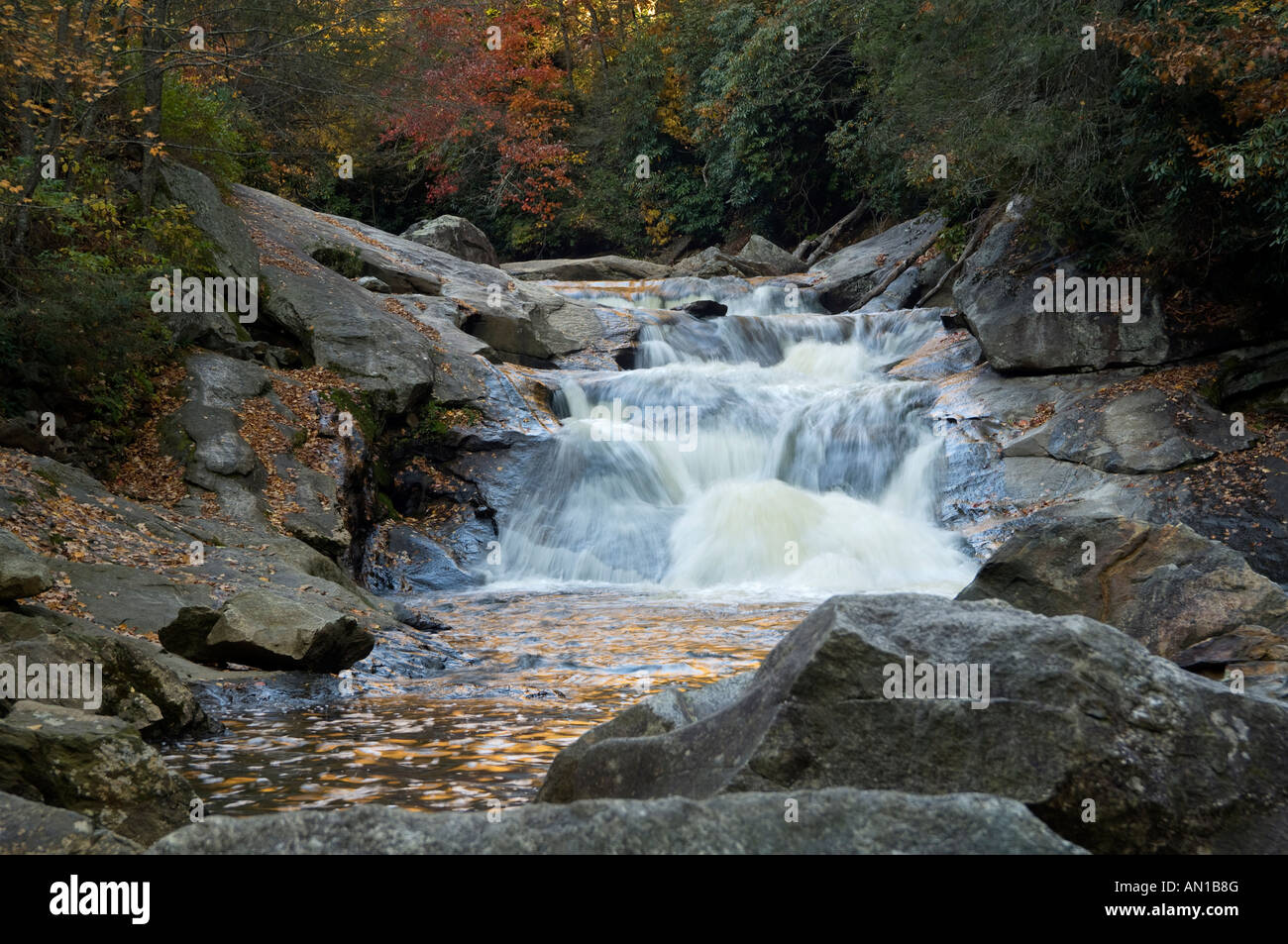 Mountain waterfall with fall foliage Stock Photo - Alamy