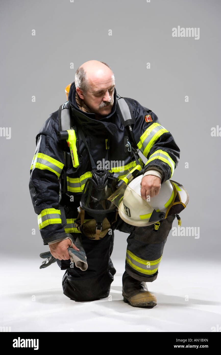 Fire fighter uniform hi-res stock photography and images - Alamy
