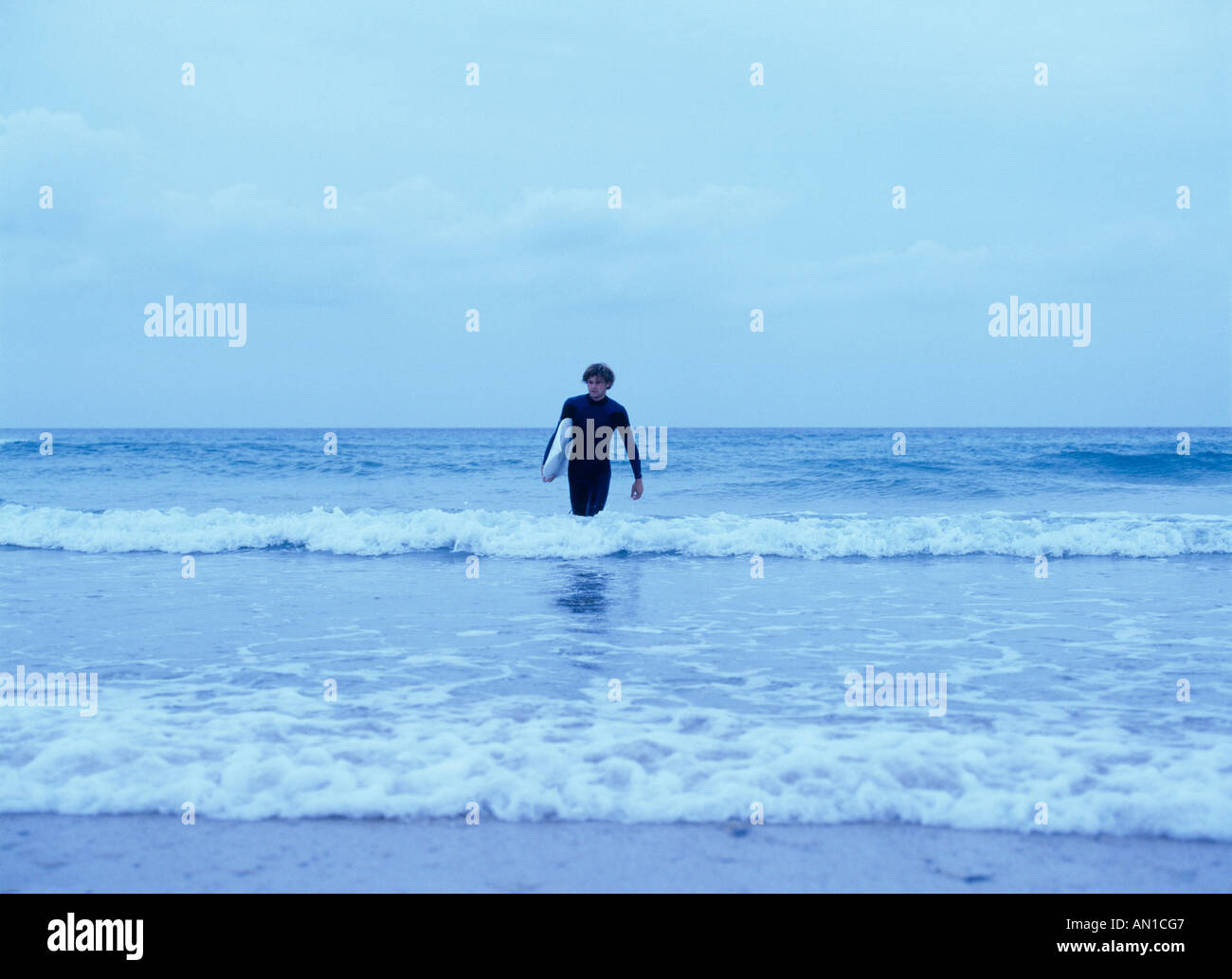 Man wading through the sea hi-res stock photography and images - Alamy