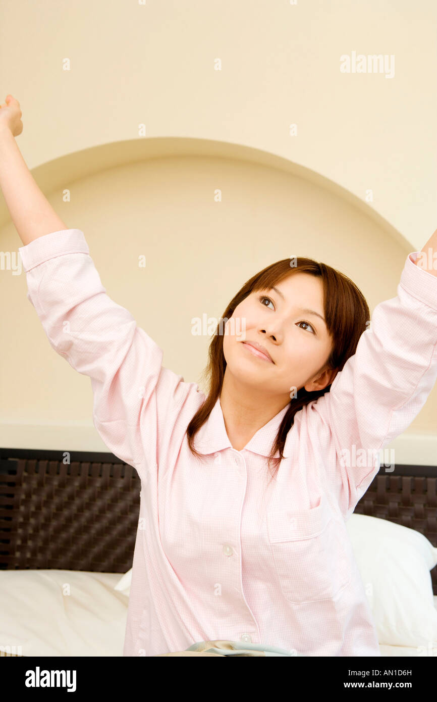 Japanese woman waking up Stock Photo - Alamy