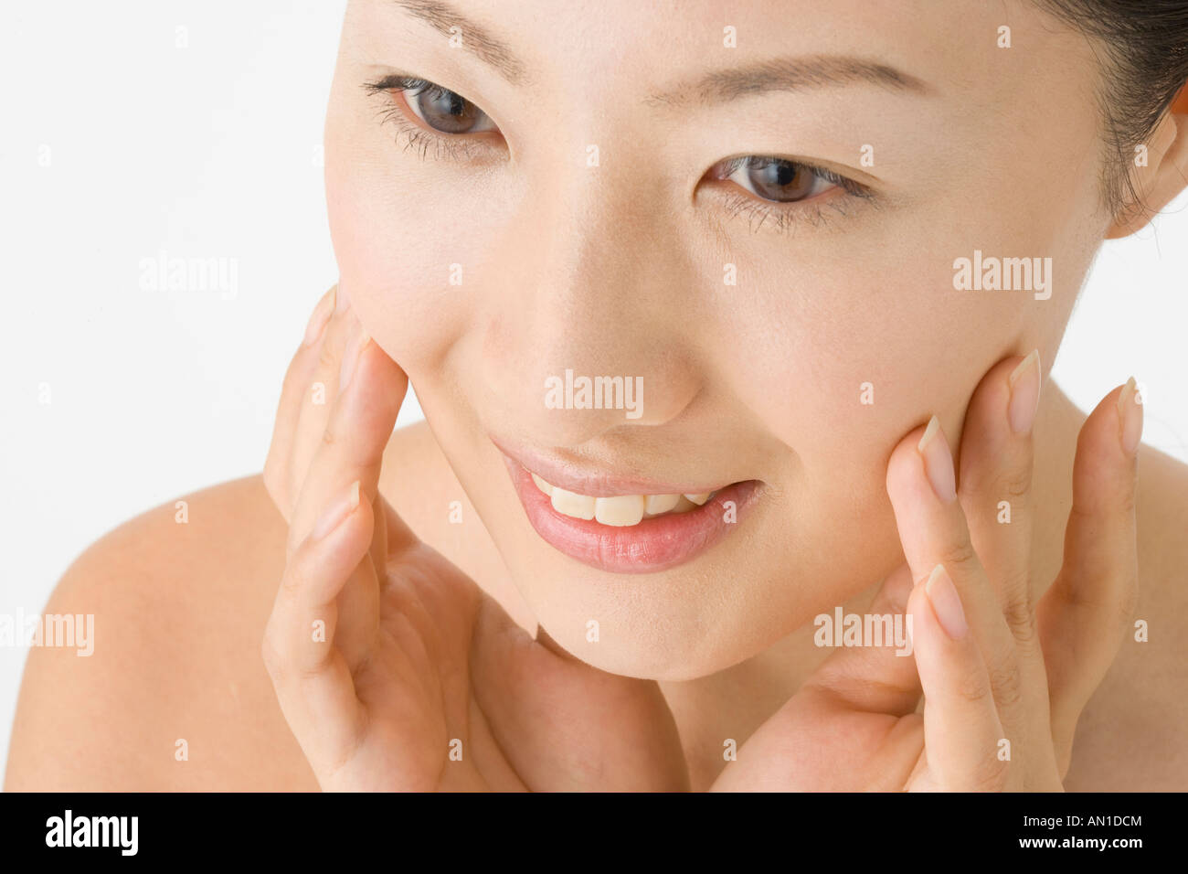Japanese woman doing skin care Stock Photo - Alamy