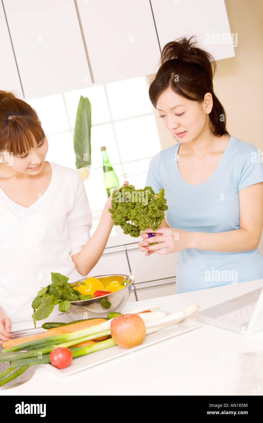 Japanese women doing cooking Stock Photo - Alamy