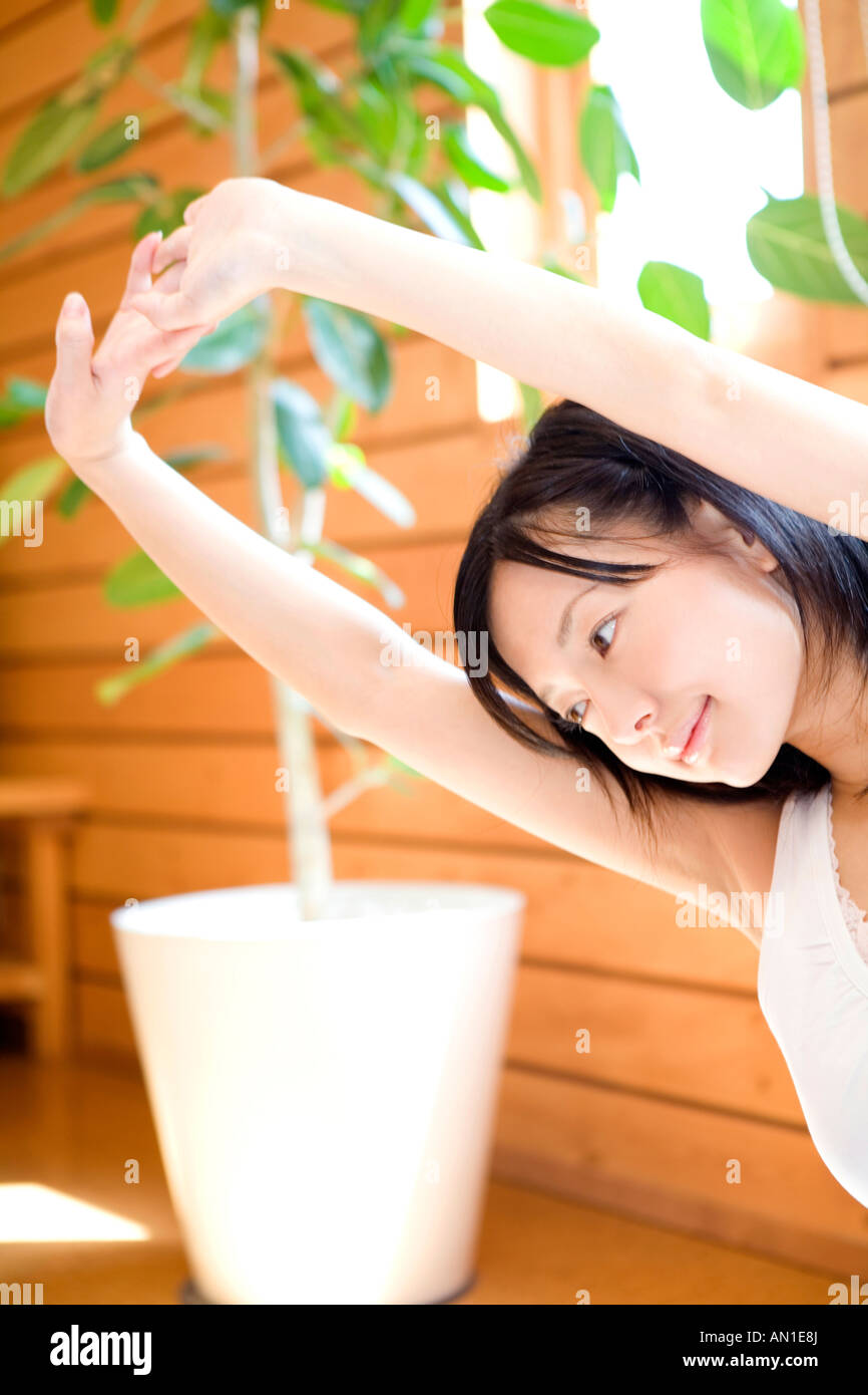 Japanese woman doing exercise Stock Photo - Alamy