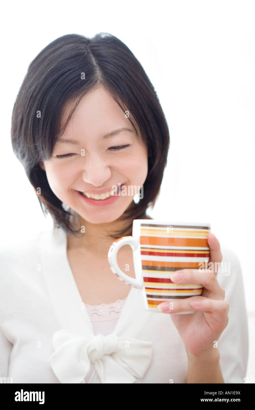 Smiling Japanese woman Stock Photo - Alamy