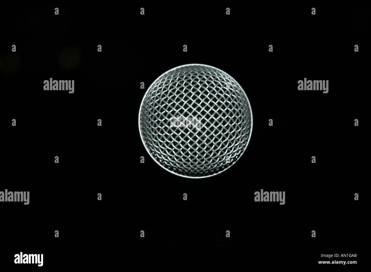 microphone tip with black background Stock Photo - Alamy