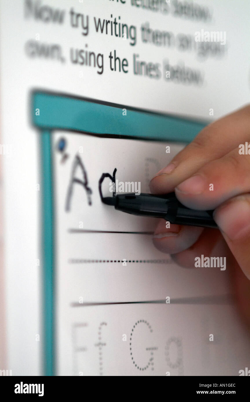 Child drawings alphabet with felt tip pen hand Stock Photo - Alamy