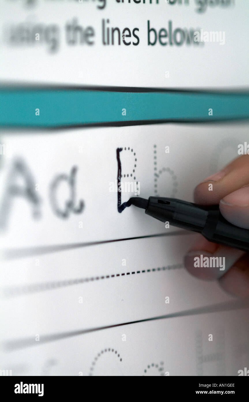 Child drawings alphabet with felt tip pen hand Stock Photo - Alamy