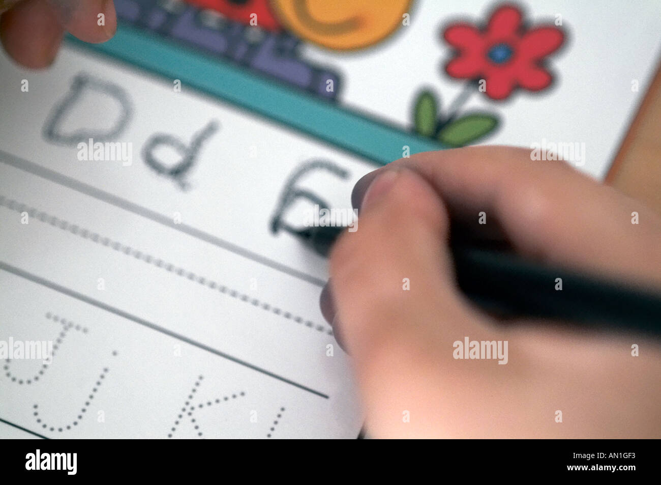 Child drawings alphabet with felt tip pen hand Stock Photo - Alamy