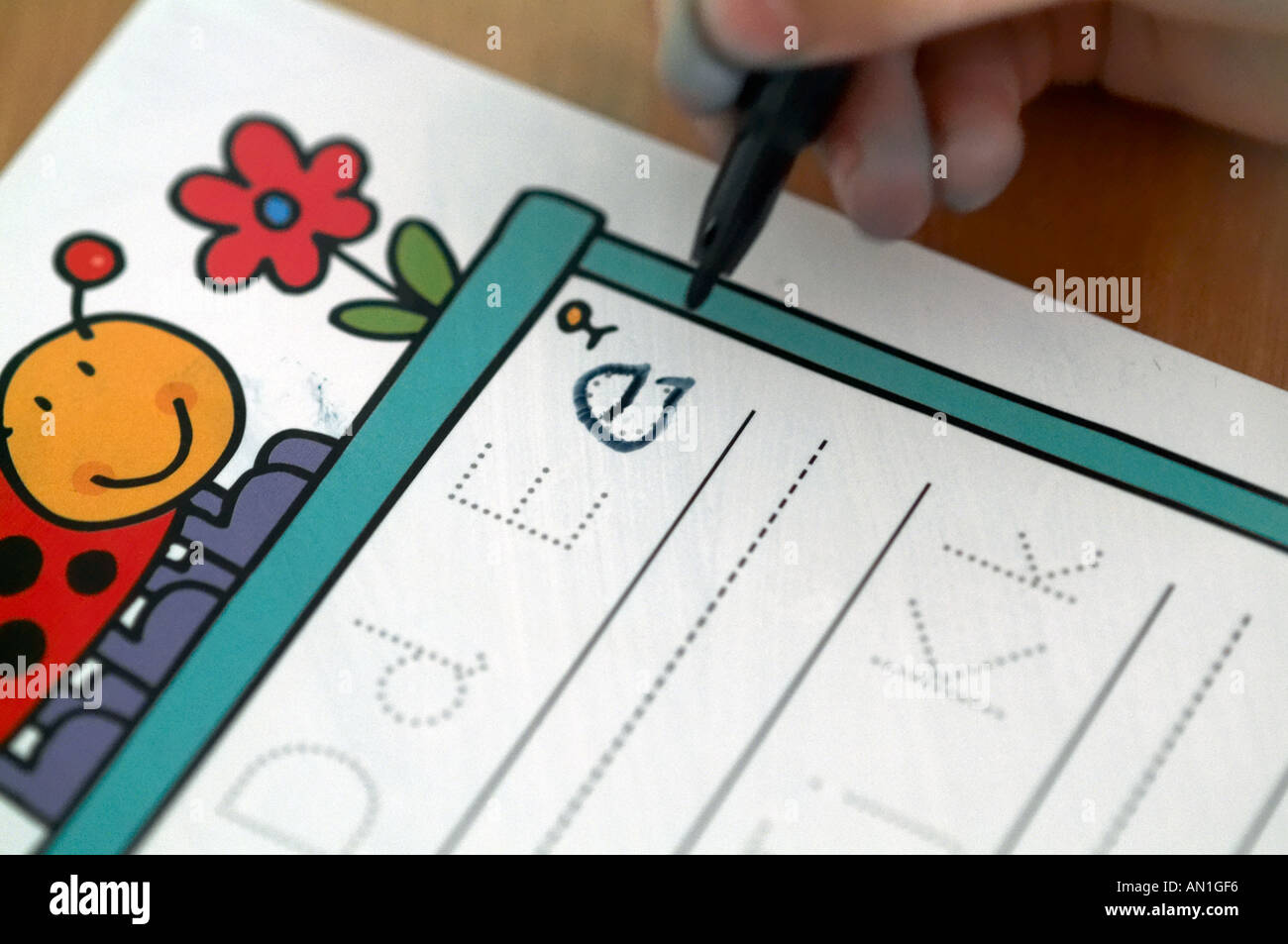 Child drawings alphabet with felt tip pen hand Stock Photo - Alamy