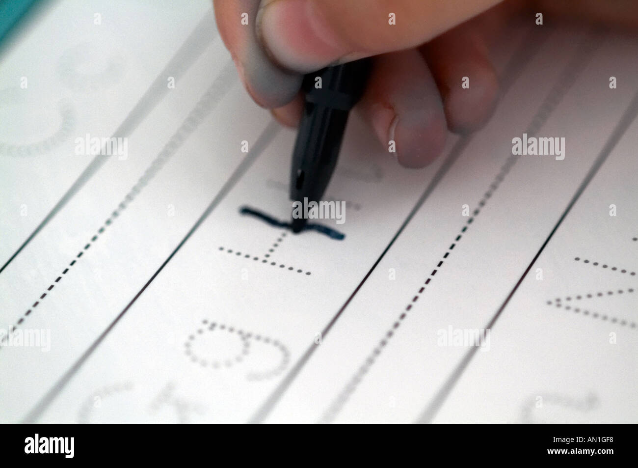 Child drawings alphabet with felt tip pen hand Stock Photo - Alamy