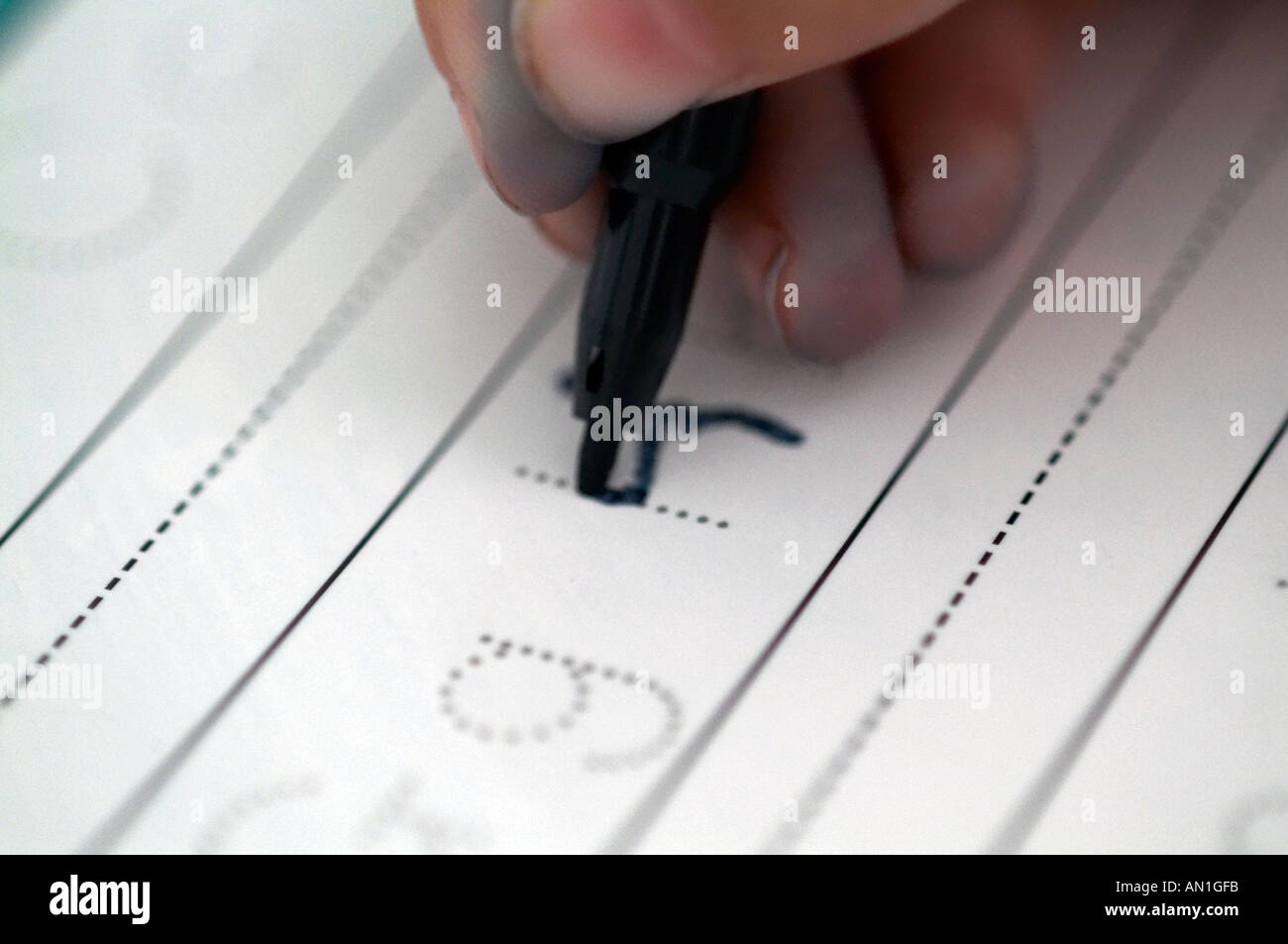 Child drawings alphabet with felt tip pen hand Stock Photo - Alamy