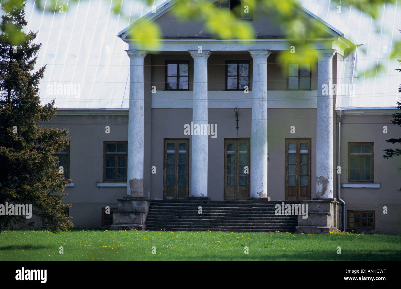 Building with four columns Stock Photo - Alamy