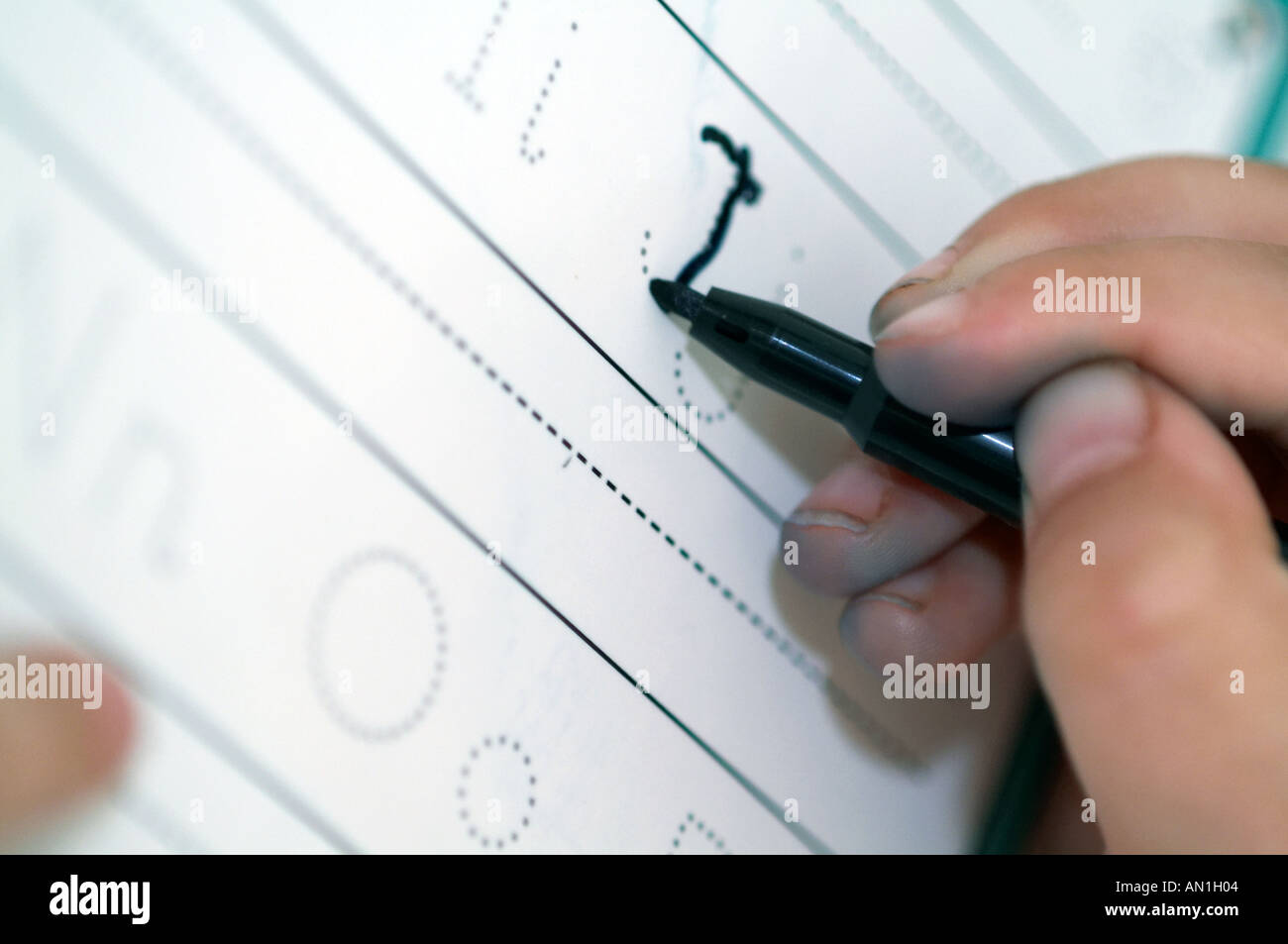Child drawings alphabet with felt tip pen hand Stock Photo - Alamy