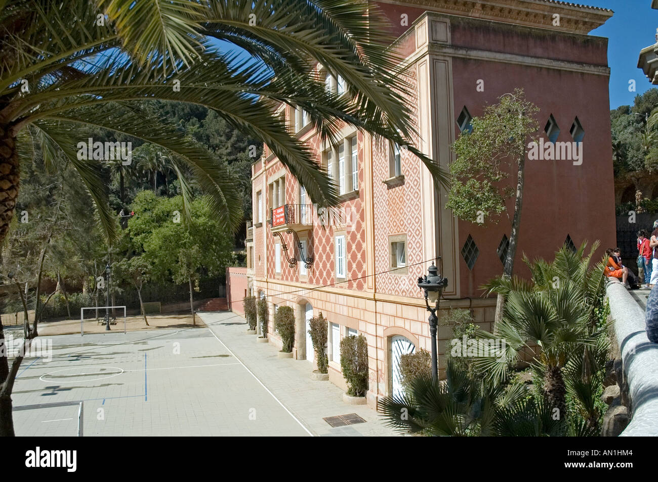 A horizontall picture of one of the houses now a school in Guell Park ...