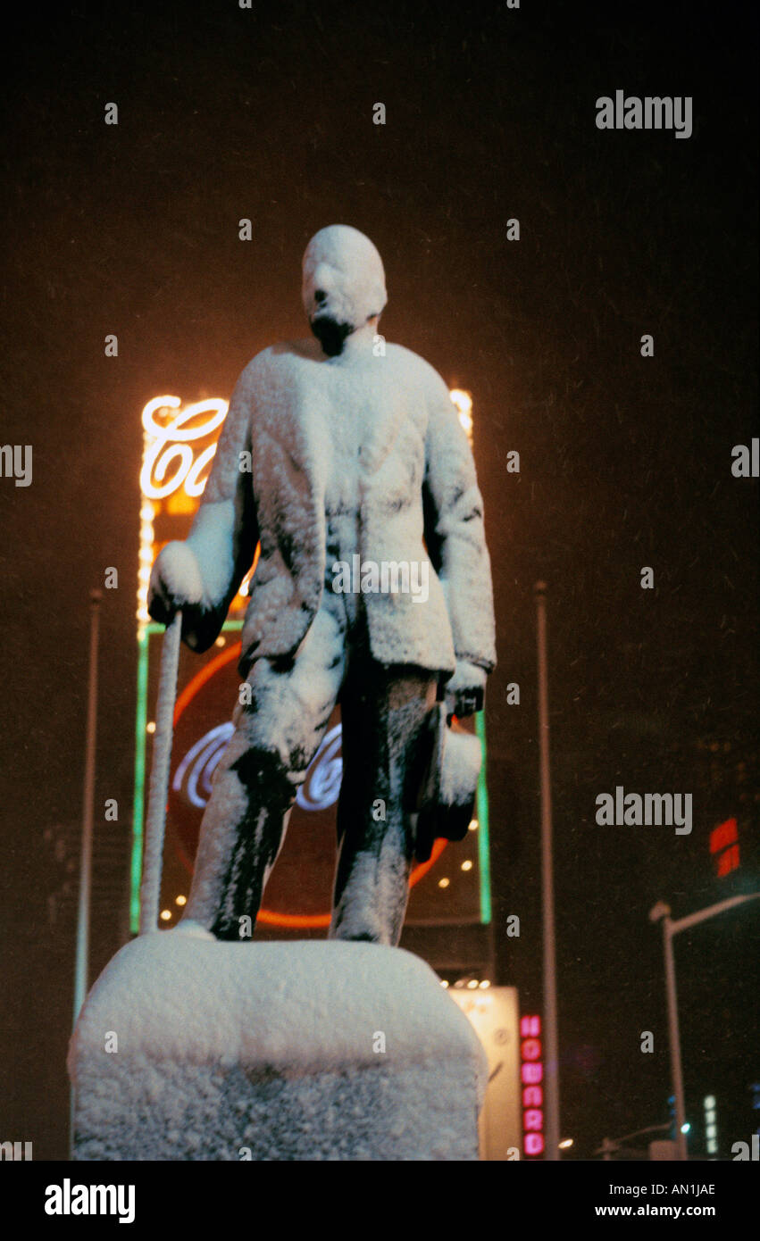 Snow covered statue, Times Square, NYC Stock Photo - Alamy