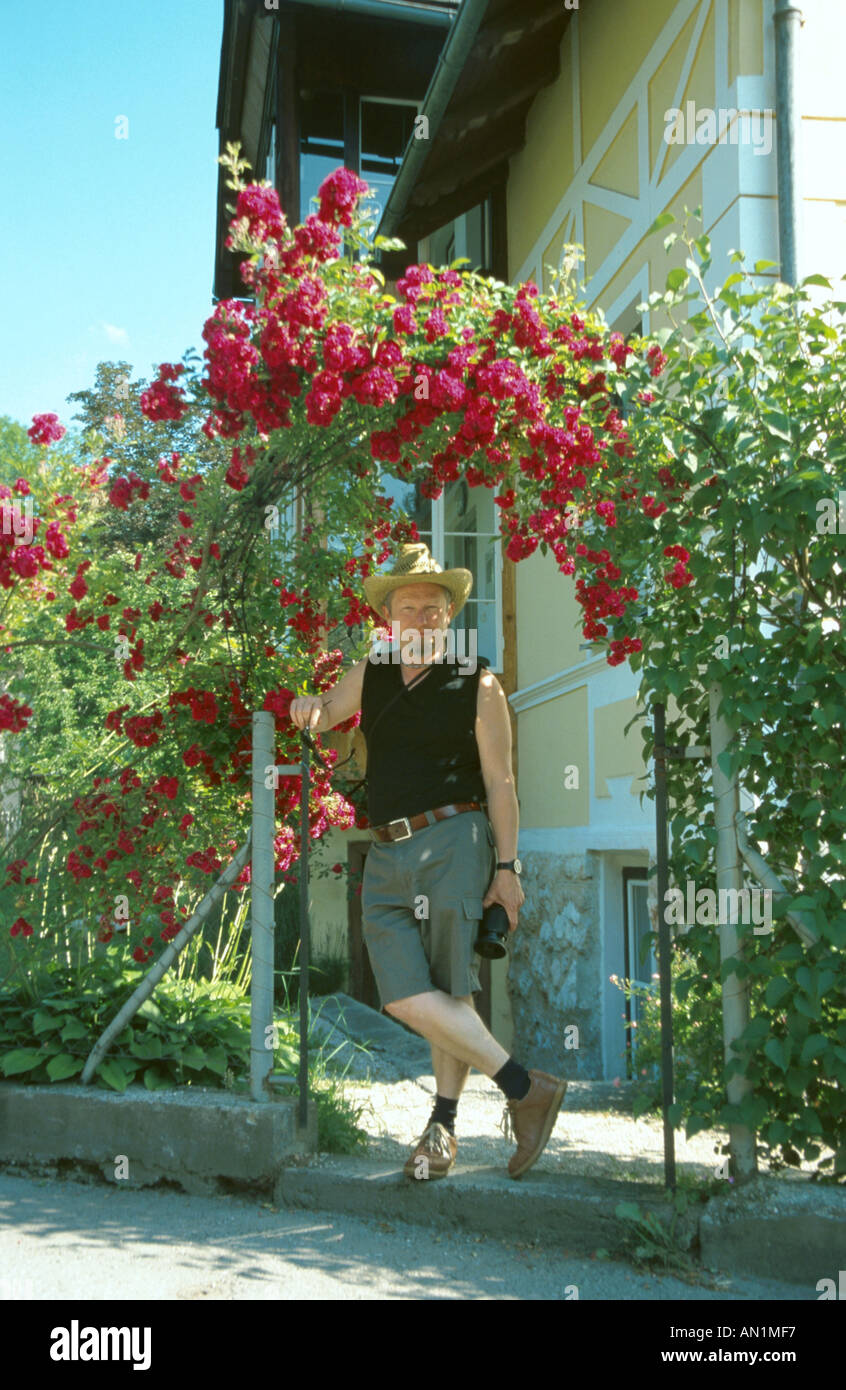 Man under rose bush hi-res stock photography and images - Alamy