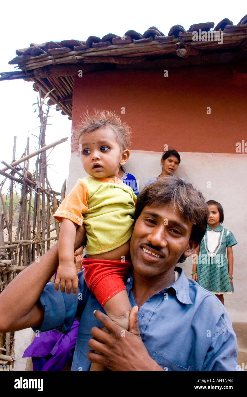 Indian father with child, India, Madhya Pradesh, Tala/Bandhavgarh NP ...