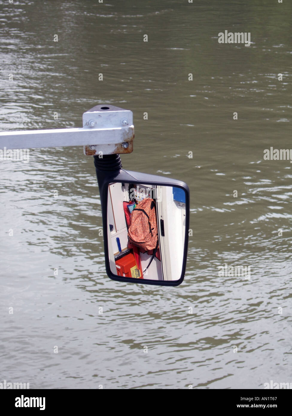 wing mirror showing rucksack on river boat Stock Photo - Alamy