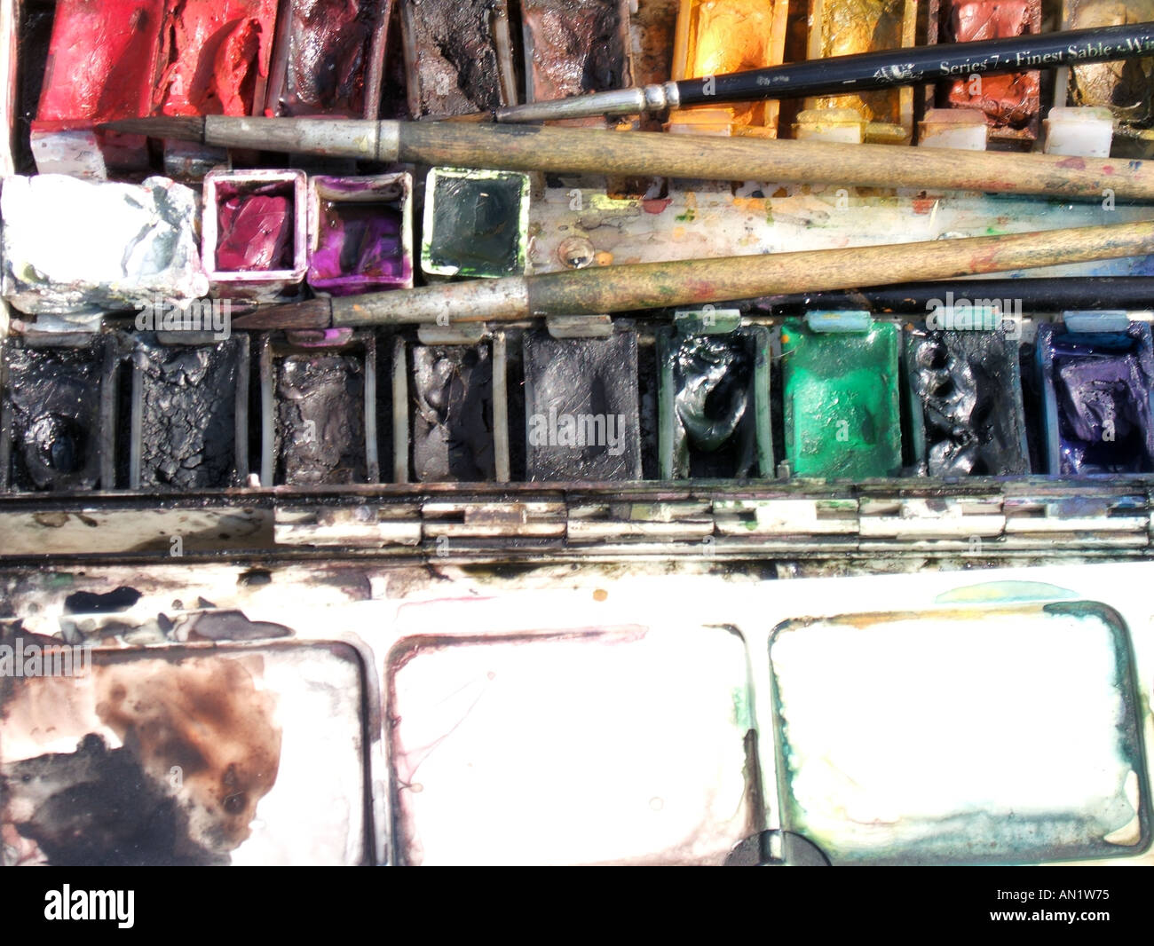 colourful paint on artists palette Stock Photo - Alamy