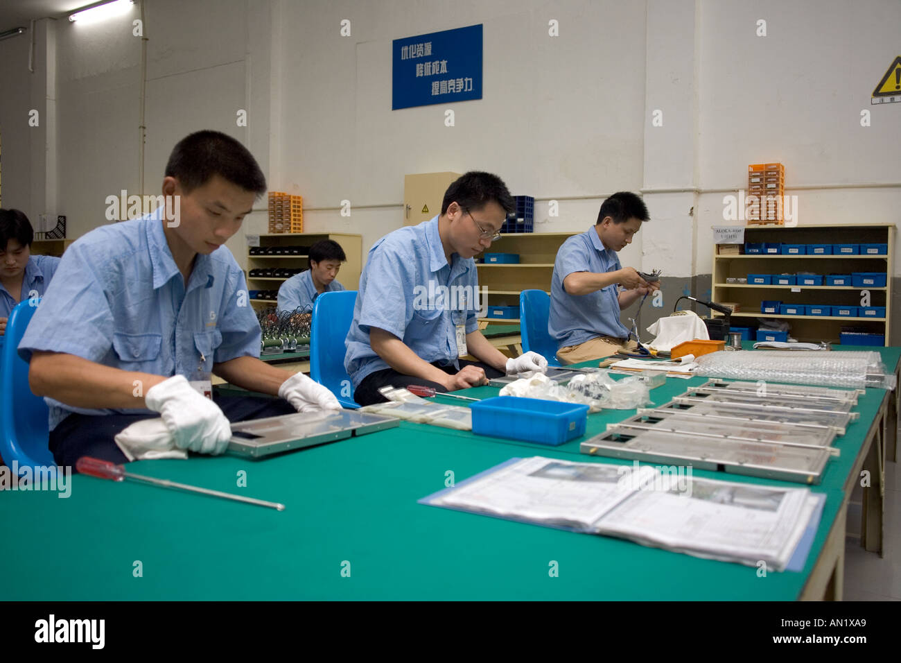 Chinese workers Manufacturing Transformers in a Factory Shanghai Stock ...