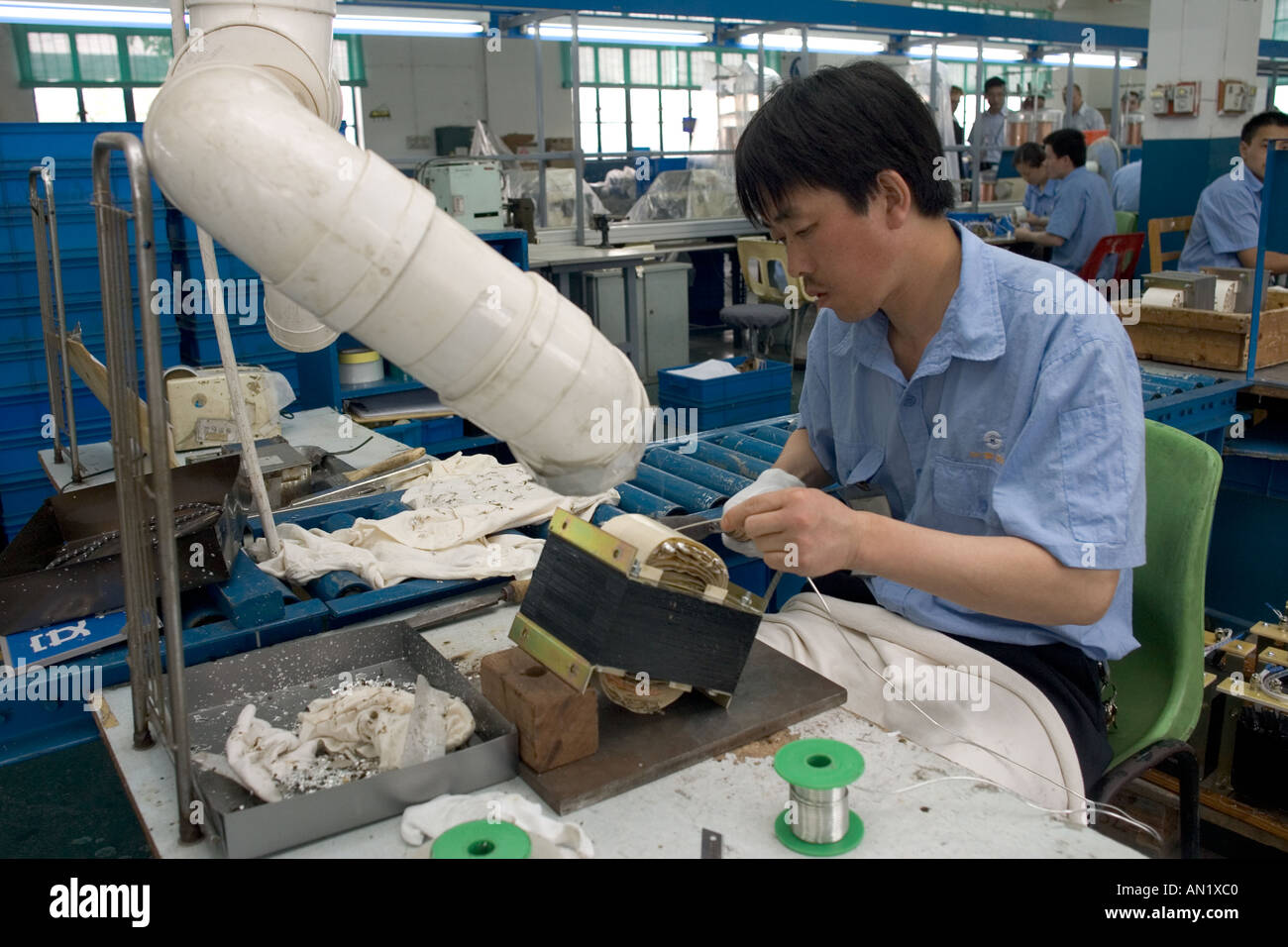 Chinese workers Manufacturing Transformers in a Factory Shanghai Stock ...