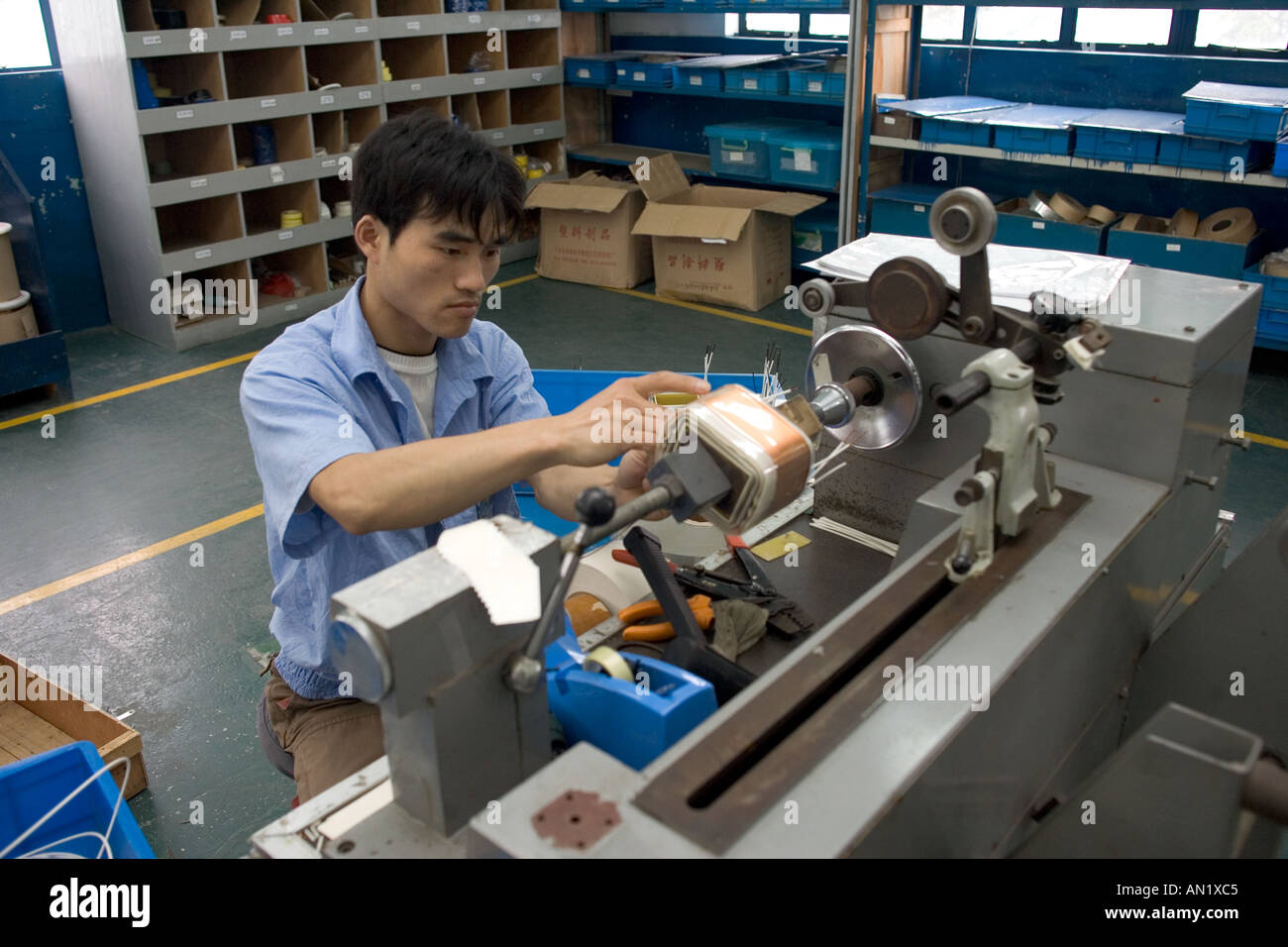Chinese workers Manufacturing Transformers in a Factory Shanghai Stock ...