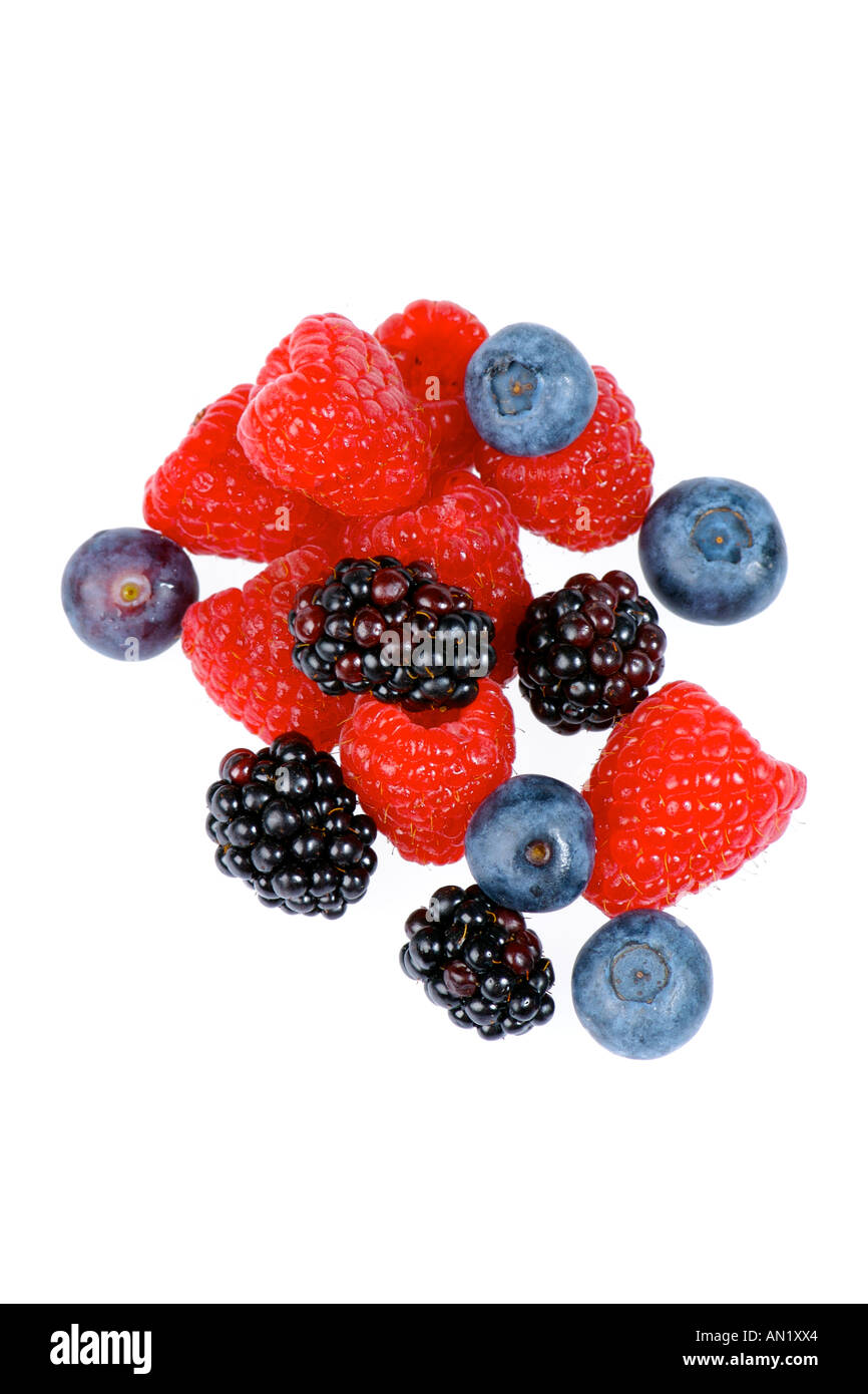 Mixed berries against a white background Stock Photo - Alamy