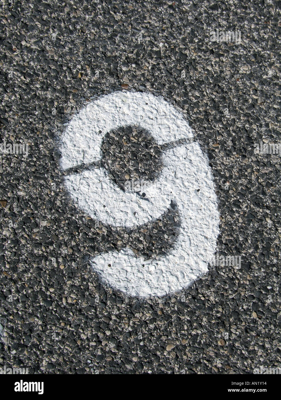 number nine painted on road surface Stock Photo - Alamy