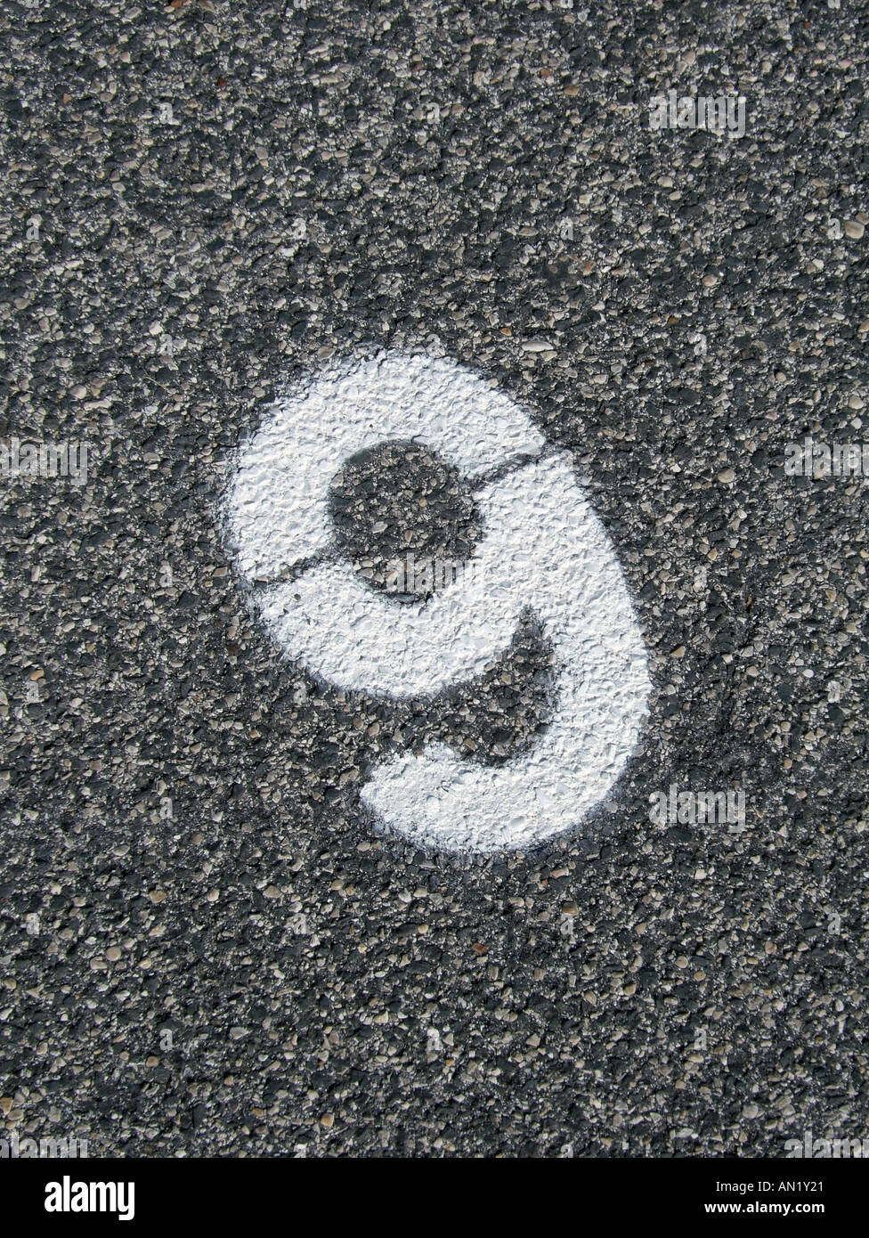 number nine painted on road surface Stock Photo - Alamy