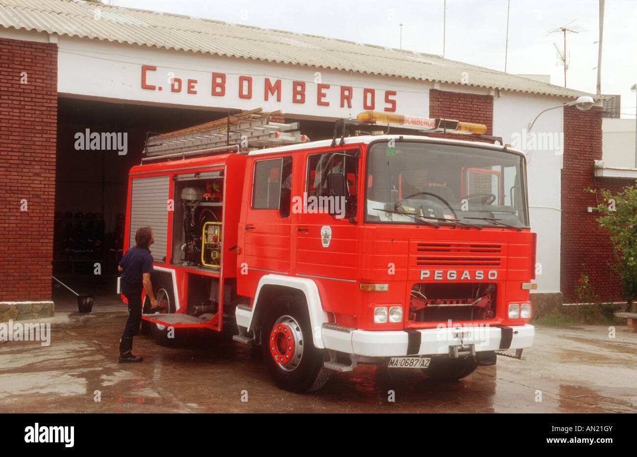 Fire engine and fire-fighter at fire station. Spain Stock Photo - Alamy