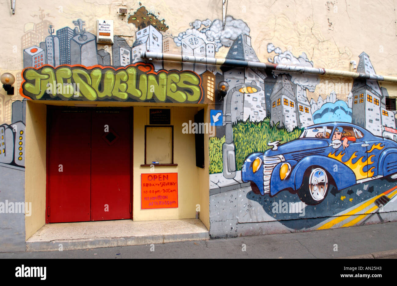 Official commercial graffiti art work on exterior wall of Jacquelines ...