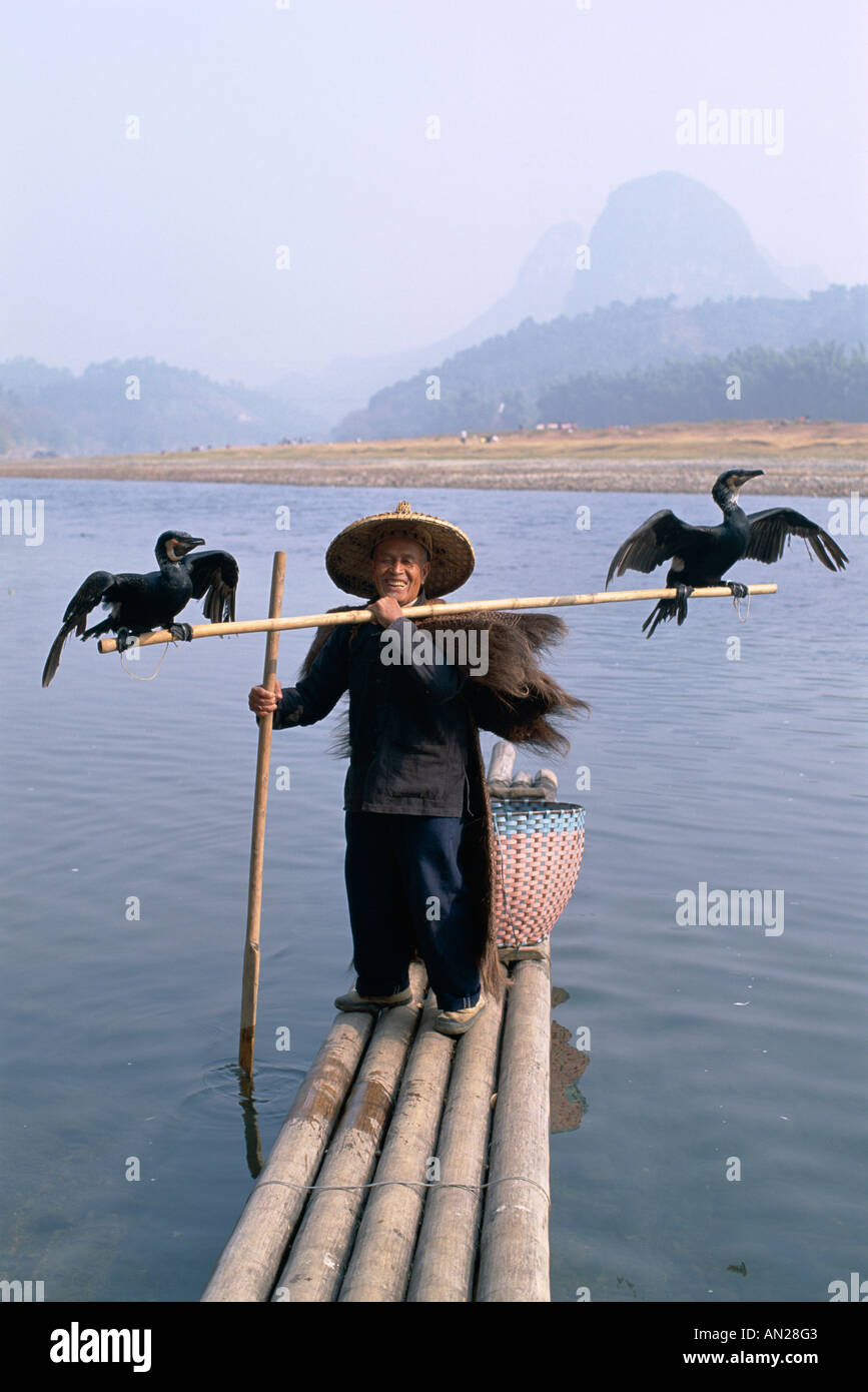 Li River / Cormorant Fisherman with Birds on Fishing Pole, Guilin ...