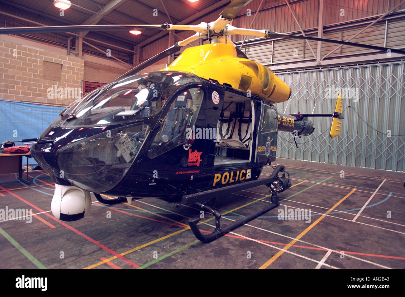 Police Air Support Unit helicopter in its hanger Stock Photo - Alamy
