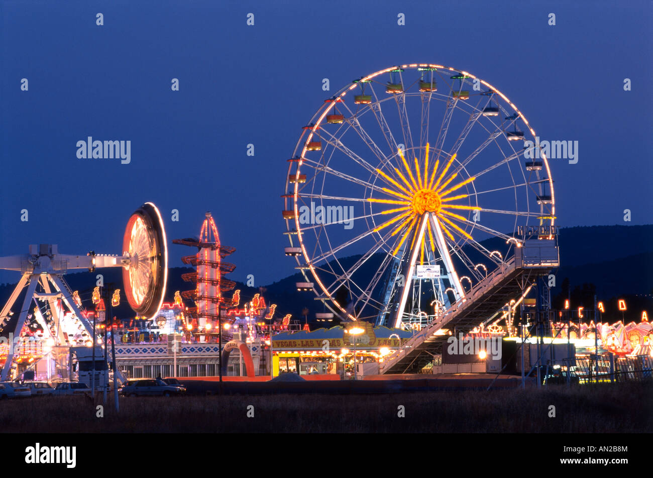 Amusement Park at Night Stock Photo - Alamy