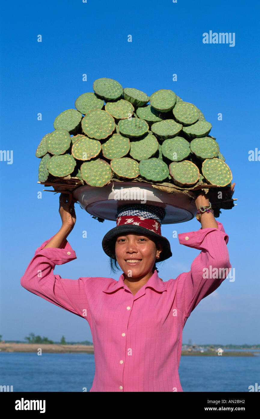 Woman Carrying Local Produce on Head, Phnom Penh, Cambodia Stock Photo ...