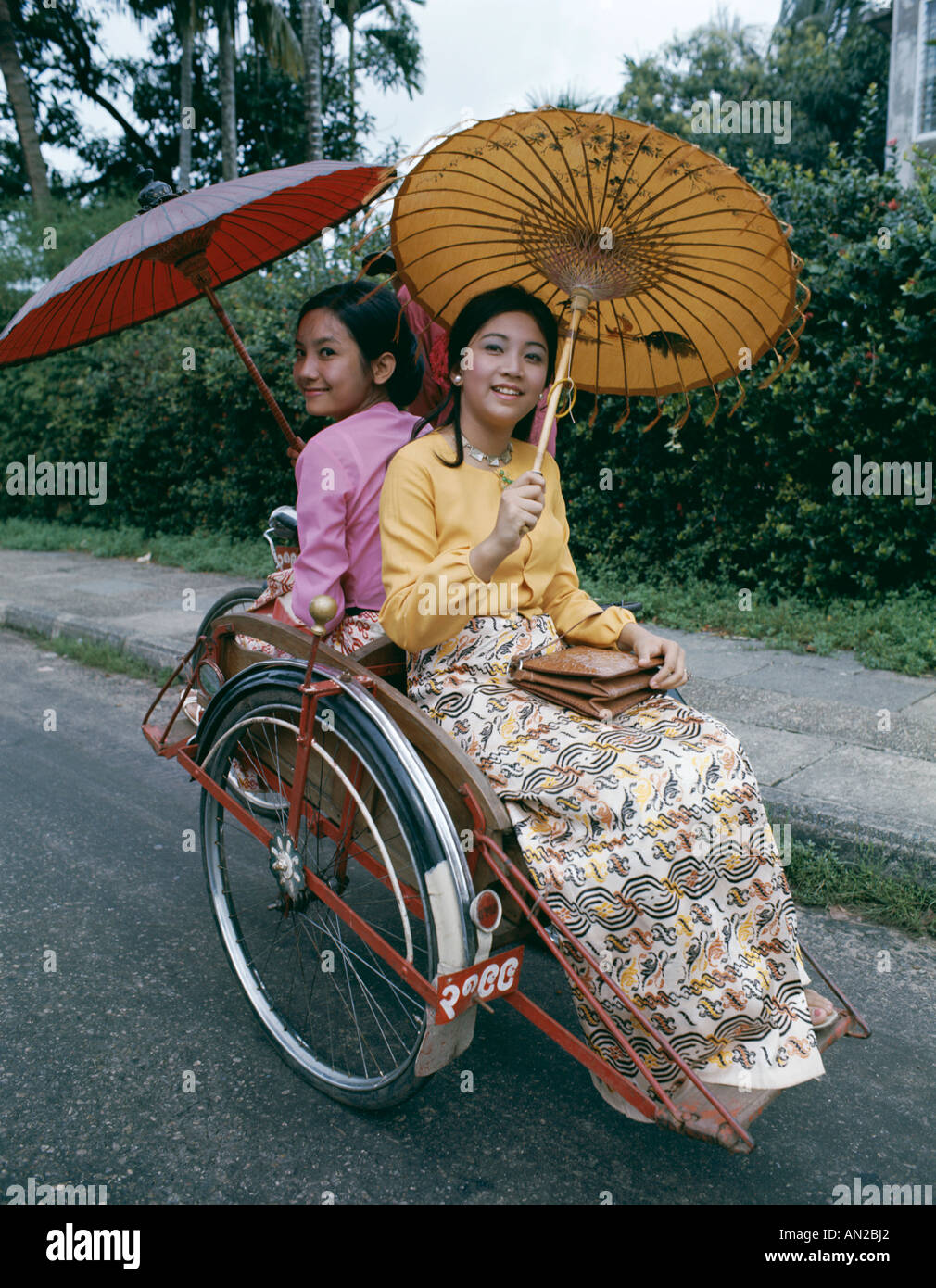 Women Dressed in Traditional Costume in Rickshaw, Yangon, Myanmar ...