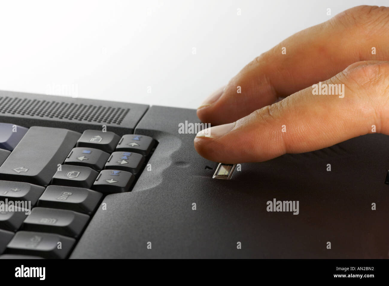 Fingerprint on a laptop Stock Photo - Alamy