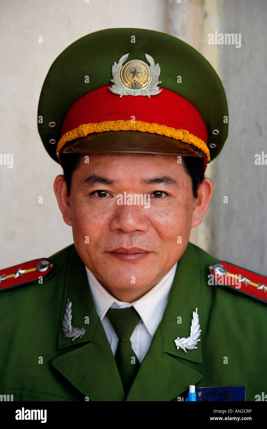 Old man in security guard uniform in Hanoi, Vietnam Stock Photo - Alamy