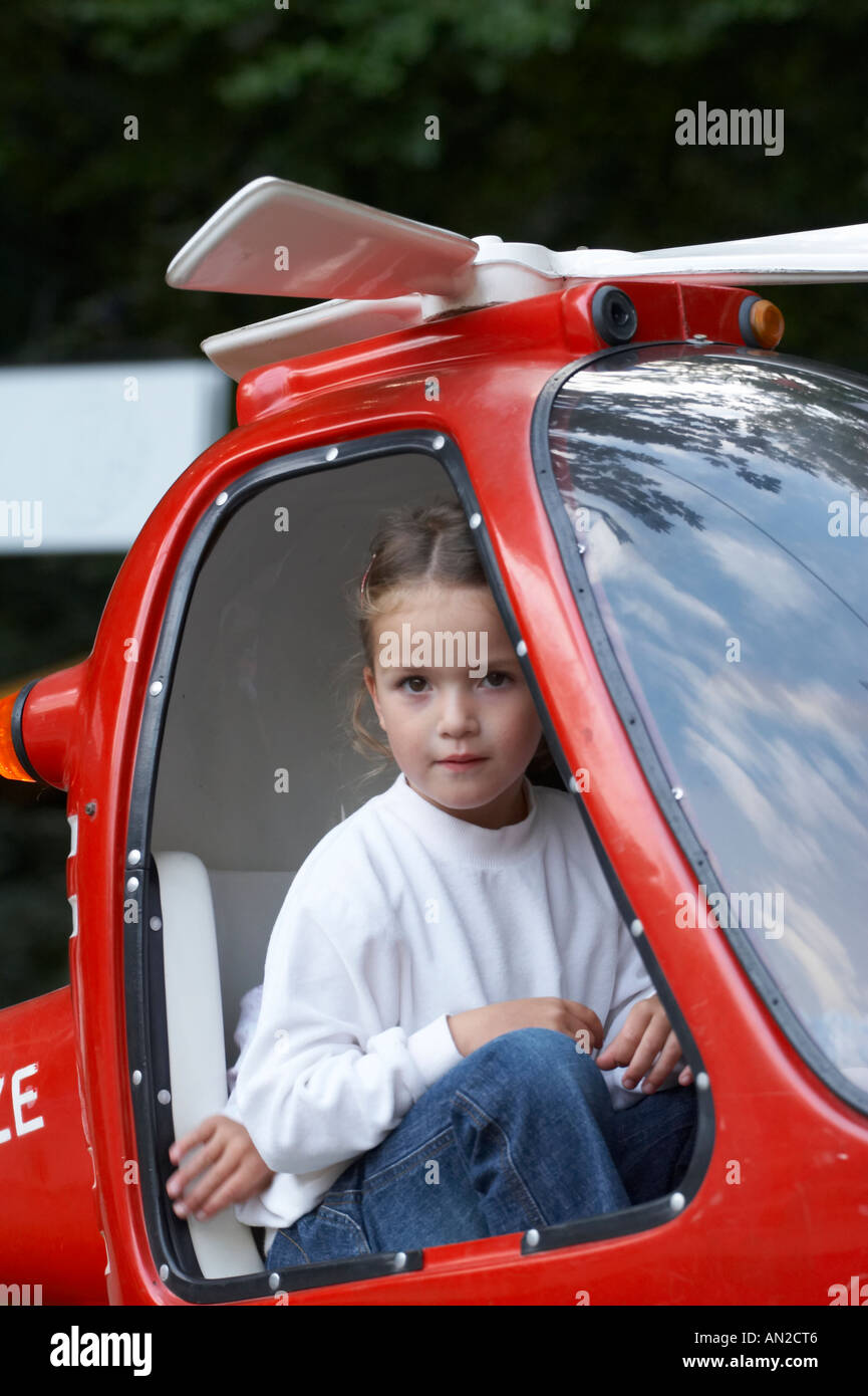 Child in helicopter on a playground Stock Photo - Alamy