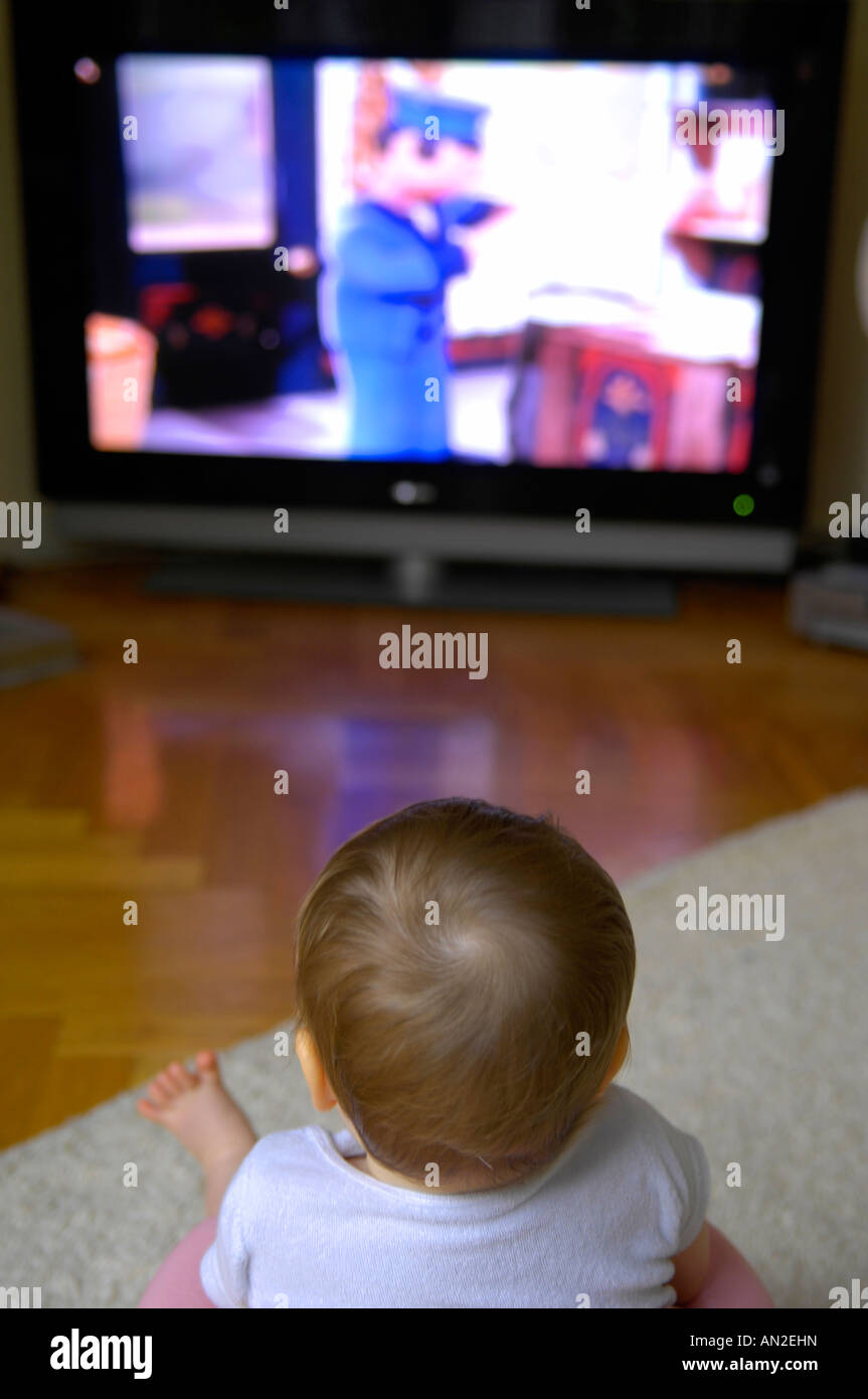 baby watching postman pat televison tv telly childrens Stock Photo - Alamy