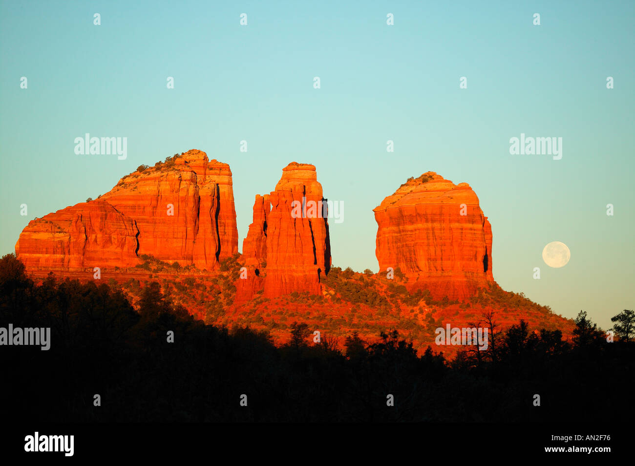 Full moon and sunrise light on Cathedral Rock Sedona Arizona Stock ...