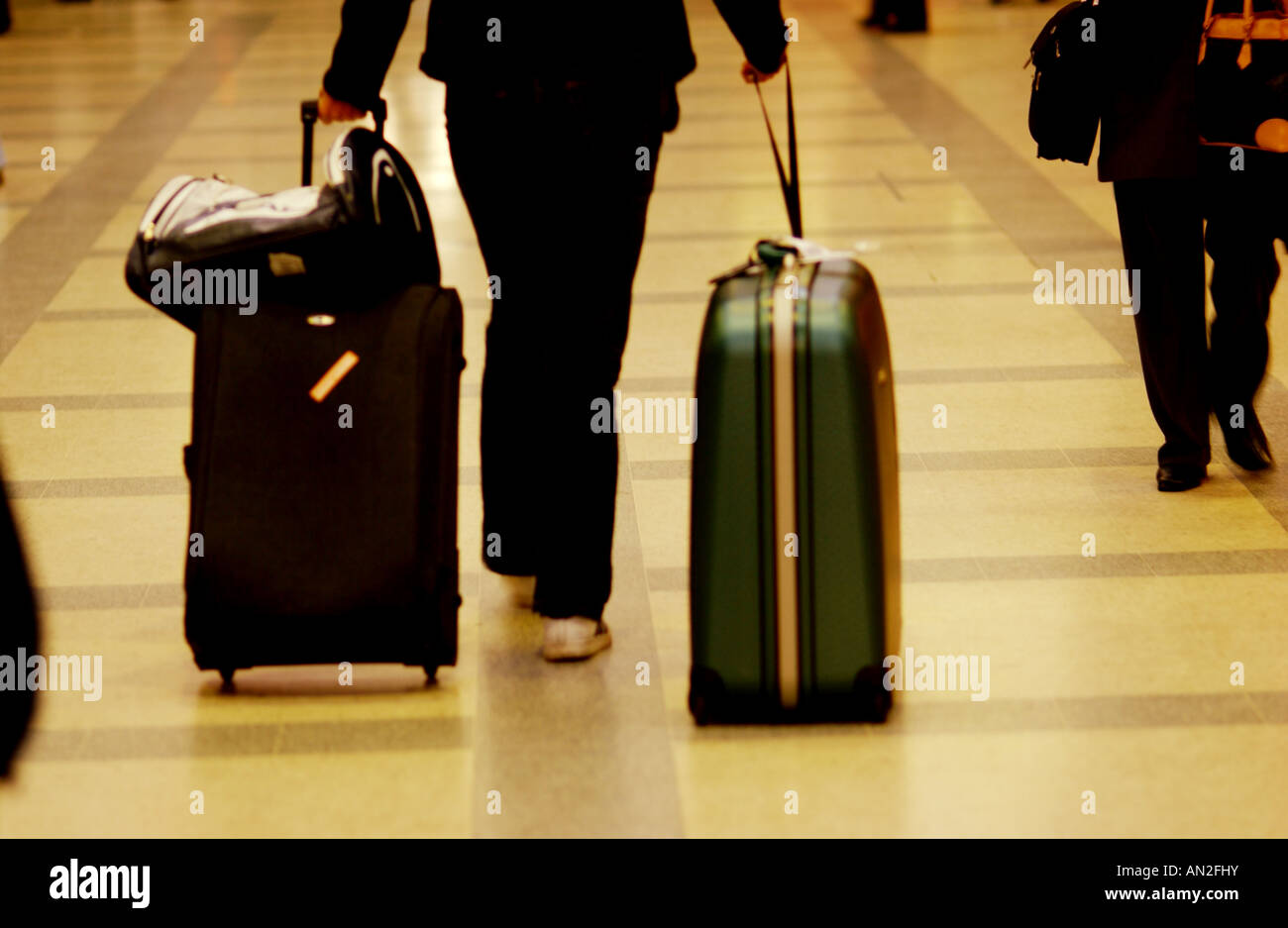 Person With Luggage Stock Photo - Alamy