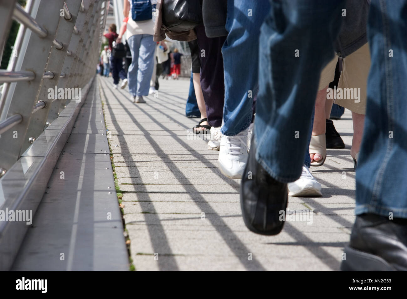 Walking on bridge Stock Photo - Alamy
