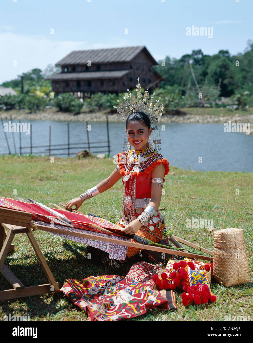 Iban Women Dressed in Traditional Costume doing Traditional Wea ...