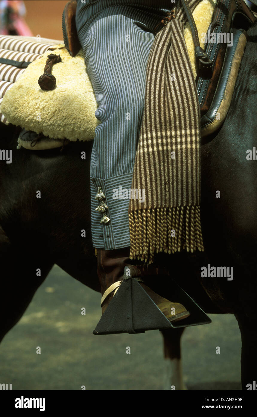 Horse riders in traditional horse riding dress in seville hi-res stock ...